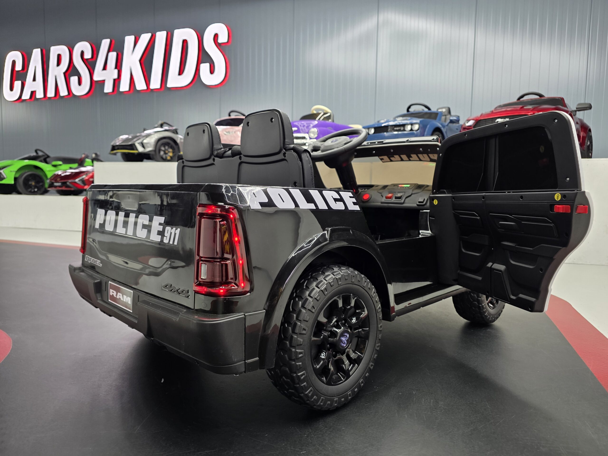 Kinderauto Dodge RAM politie 12 volt - Cars4Kids